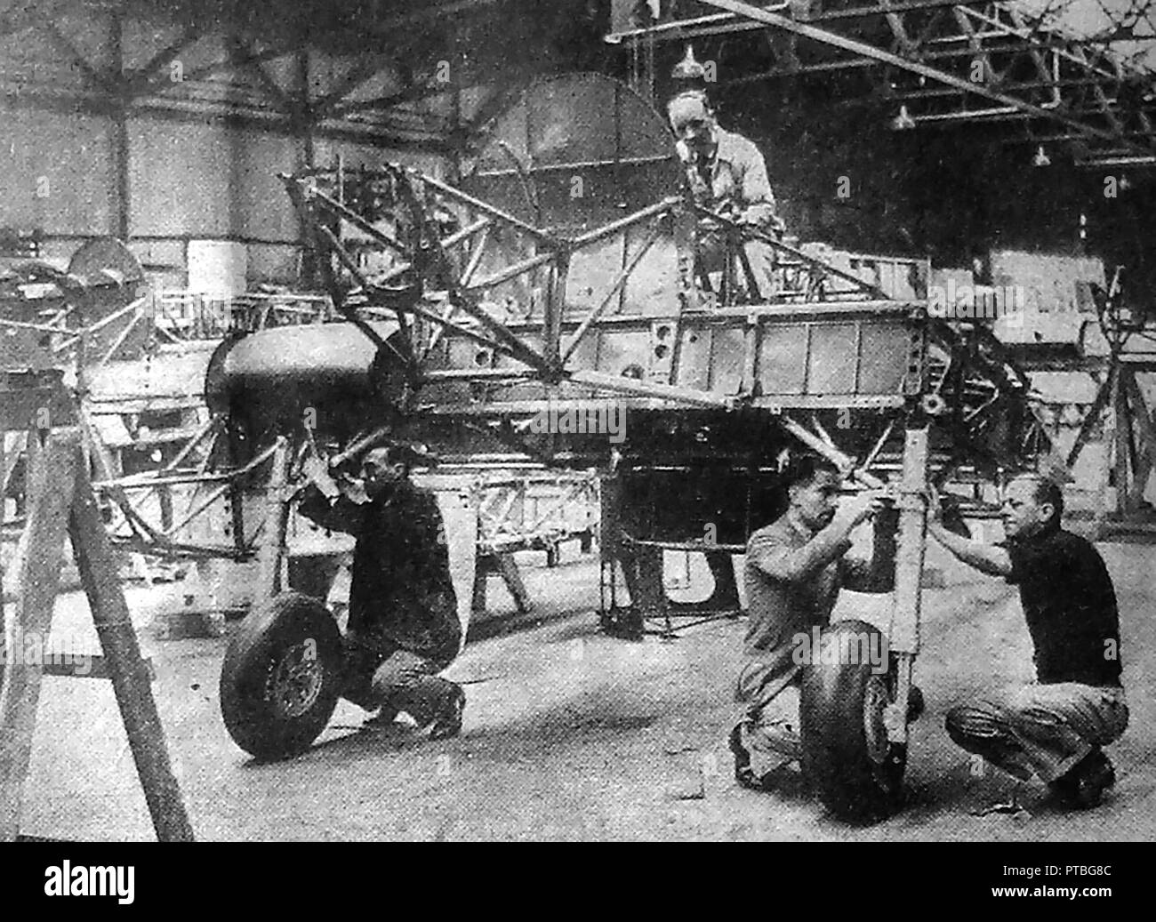 A 1938 illustration showing work being undertaken on a Hawker Hurricane ...