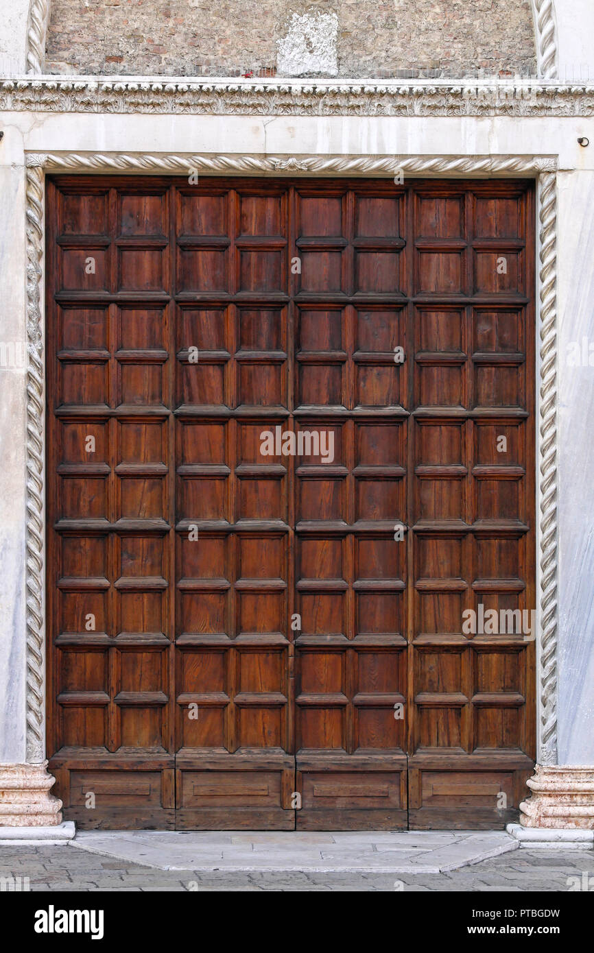 Big medieval wooden gate in Venice Stock Photo - Alamy