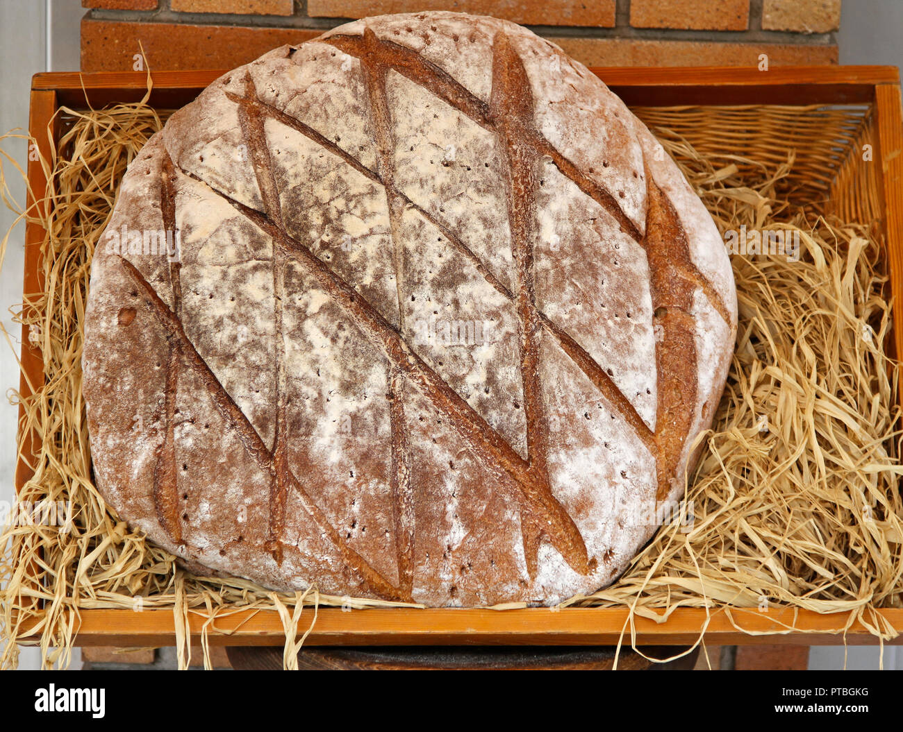 Rustic bread round loaf at bakery window Stock Photo - Alamy
