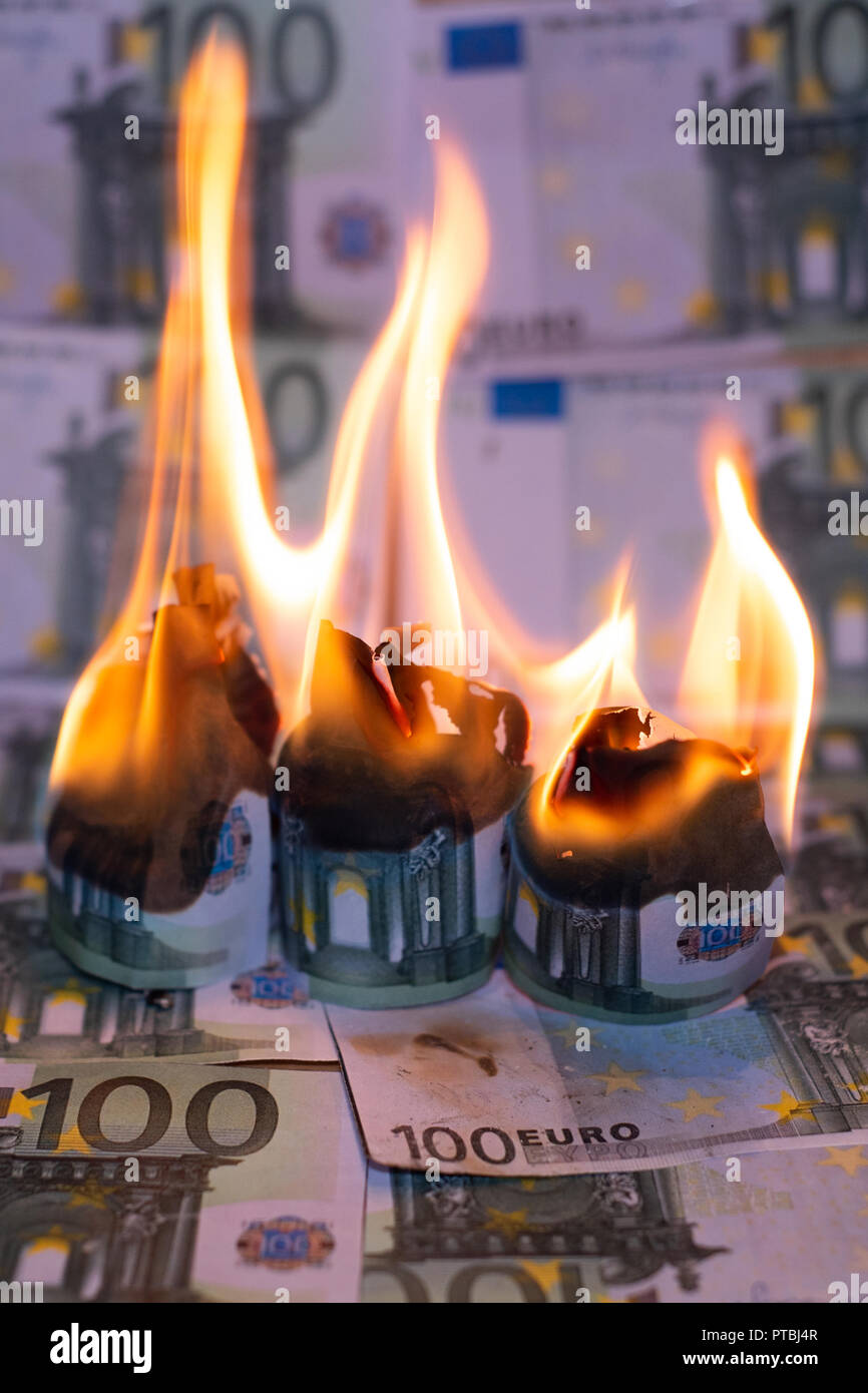 One hundred euro bill in Europe currency is on fire Stock Photo - Alamy
