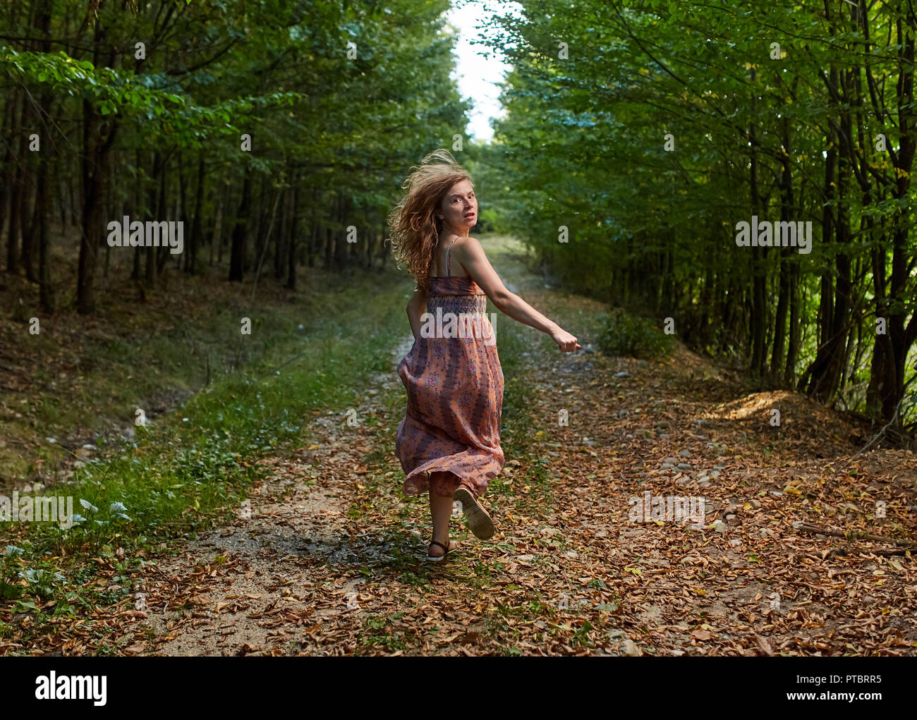 Girl running scared hi-res stock photography and images - Alamy