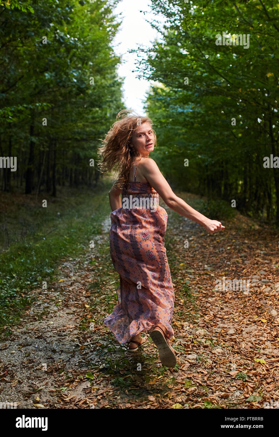 Woman running scared outdoor hi-res stock photography and images - Alamy