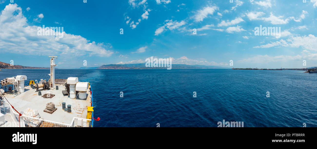 View of the Messina sea strait and coastline from the side of the ferry ...