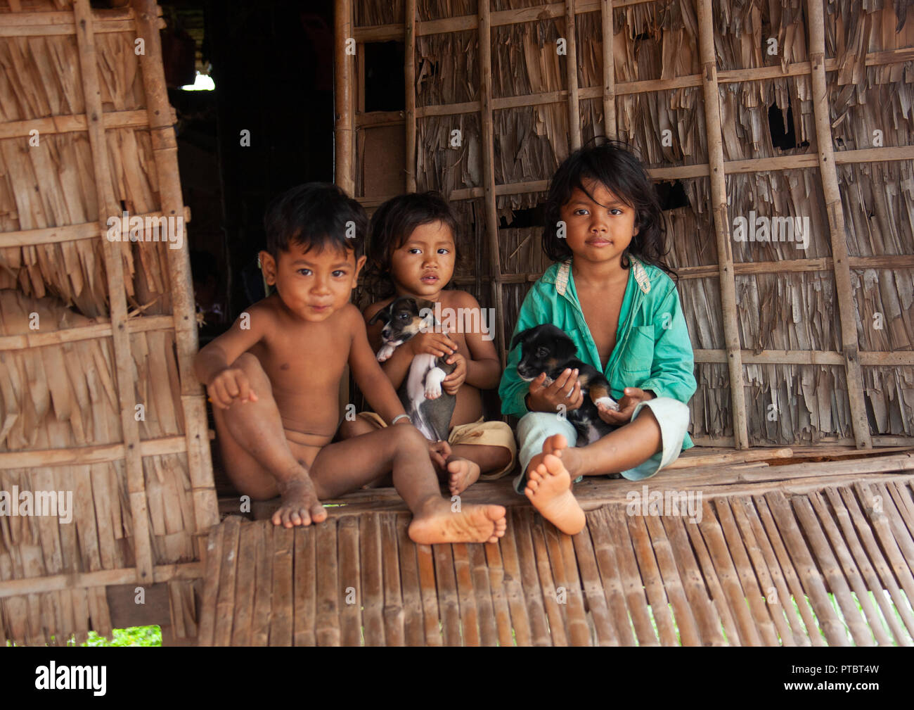 Cambodian children in the floating village on Tonle Sap lake, Siem Reap ...