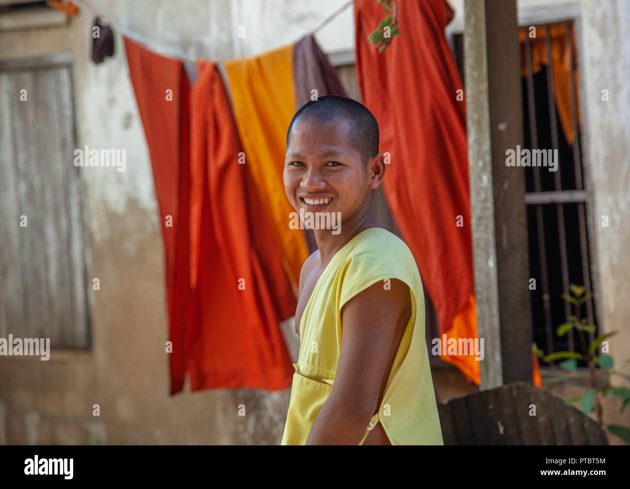 Young smiling monk in a monastery, Battambang province, Battambang ...