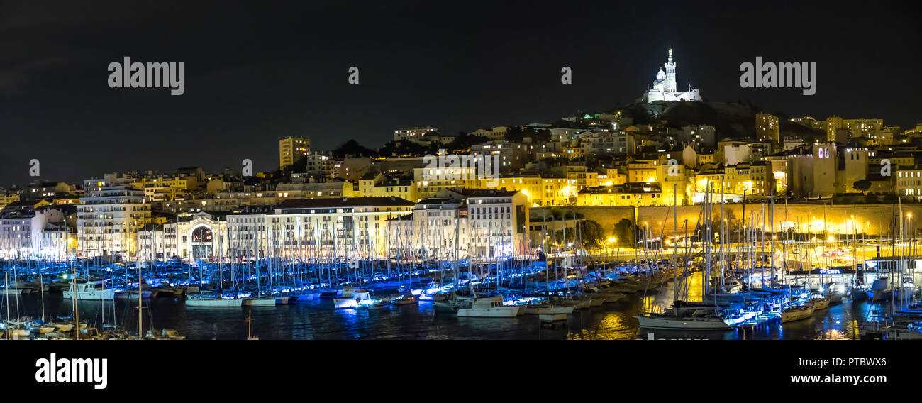 Vieux port and notre dame de la garde by night hi-res stock photography ...