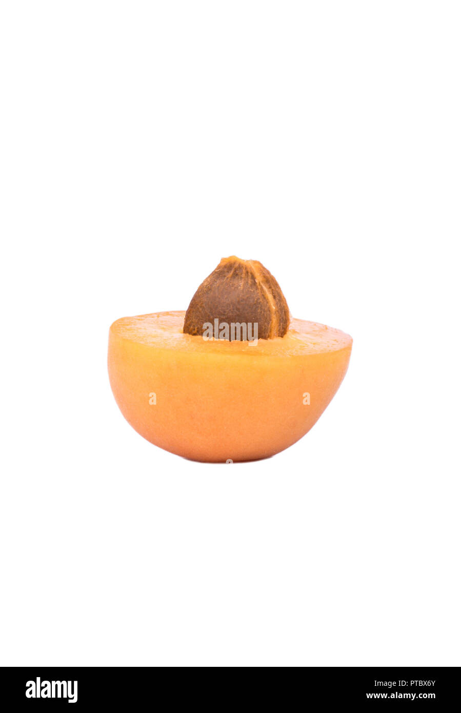 Fresh apricot fruit cut in half with a bone inside isolated on white ...