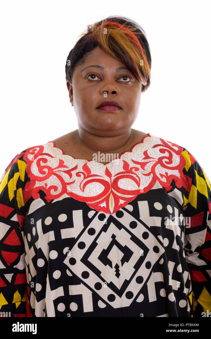 Studio shot of fat black African woman thinking while looking up Stock ...