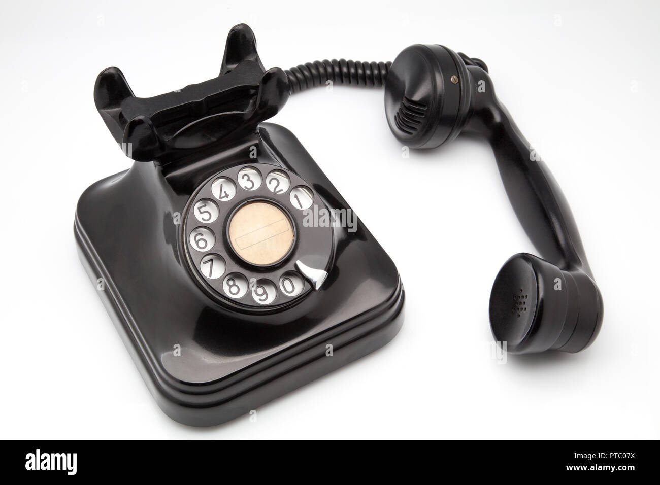 Black telephone cut out on white retro hi-res stock photography and ...