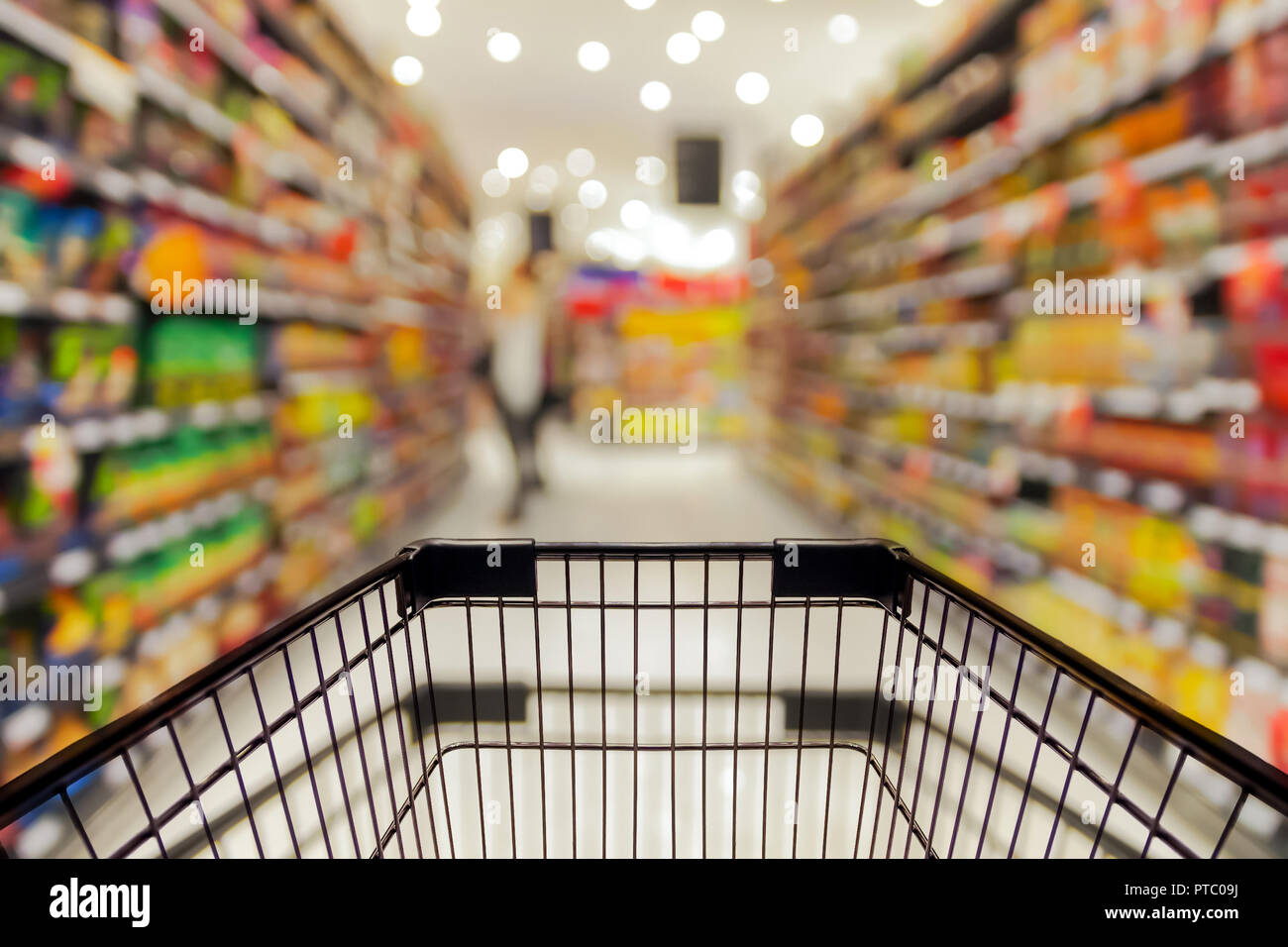 Abstract blurred photo of store with trolley in department store bokeh background Stock Photo ...