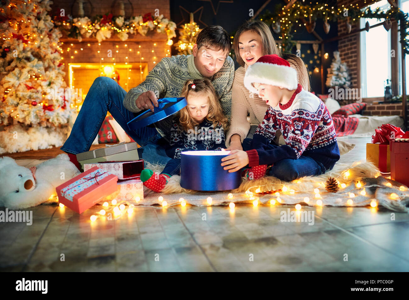 Children playing with gifts hi-res stock photography and images - Alamy