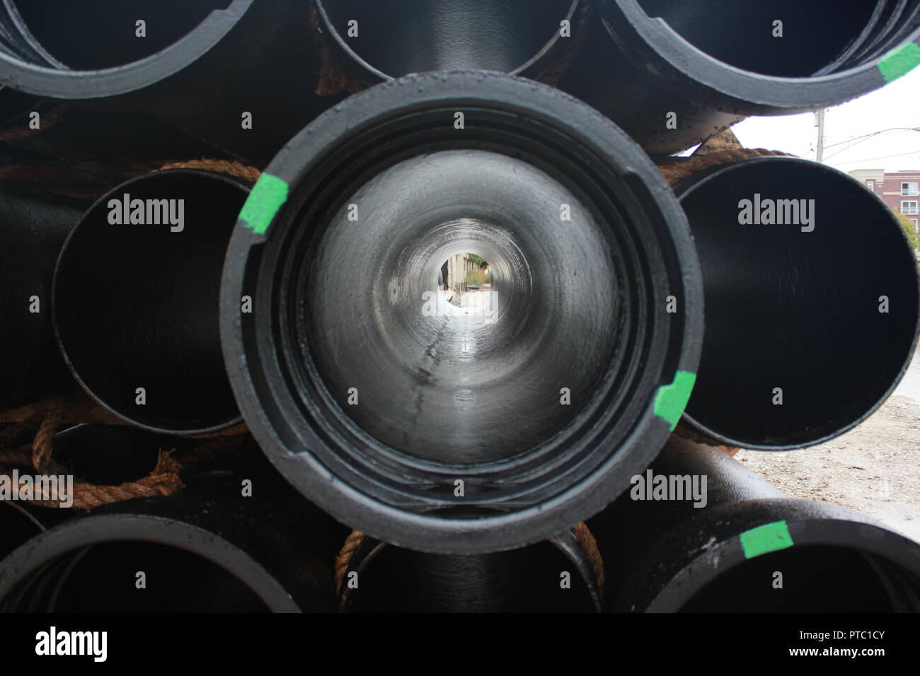 Looking inside a long black pipe with light at the end of the line ...