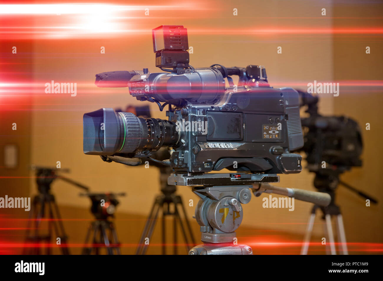 Video camera lens - recording show in TV studio - focus on camera ...