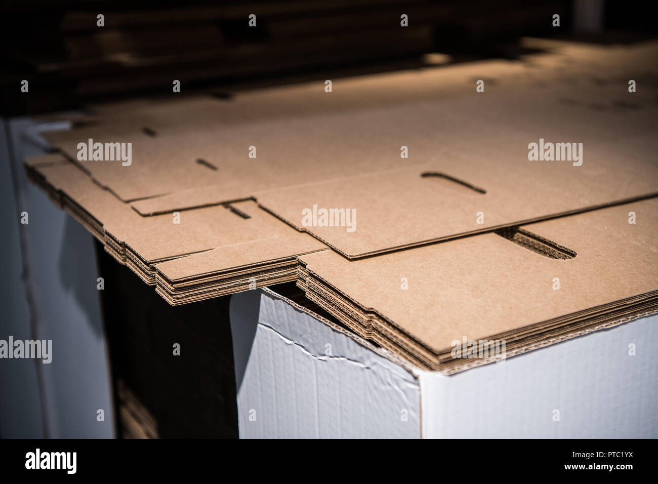 many non-assembled cardboard parcel boxes on stock close up Stock Photo ...