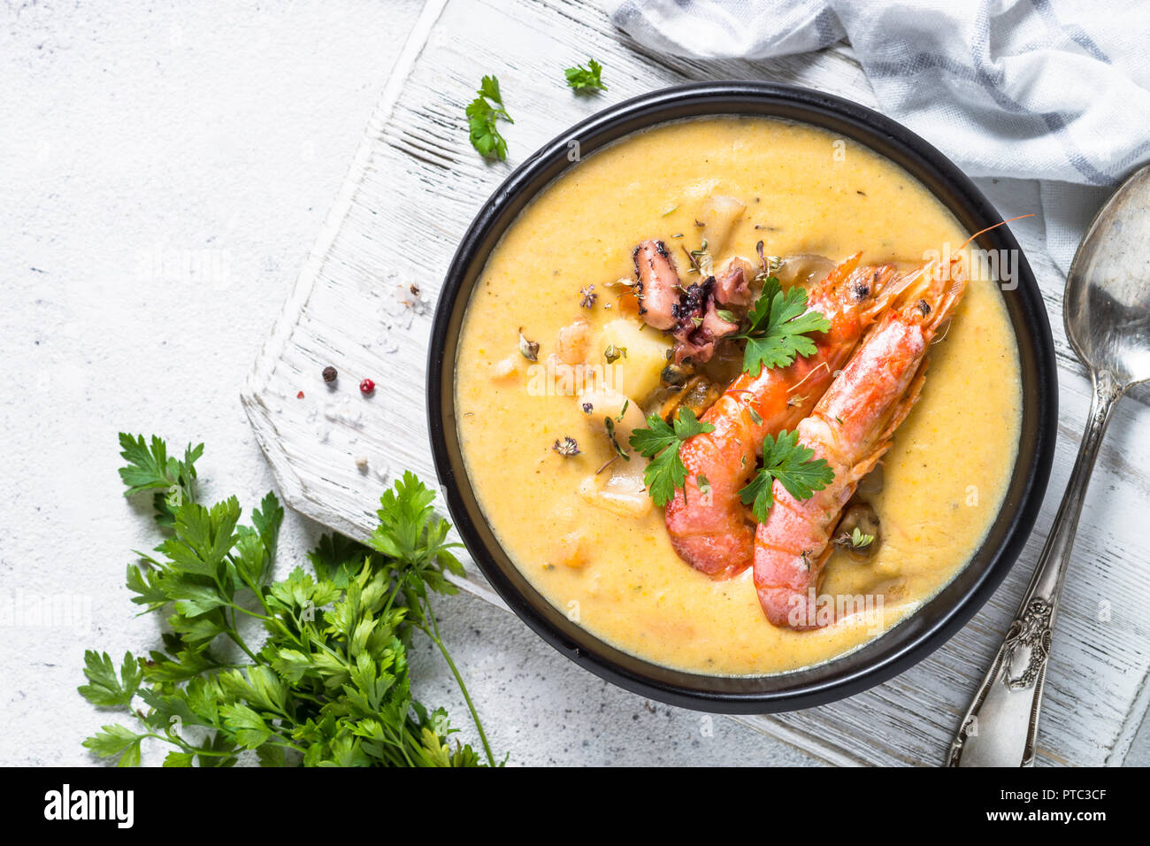 Chowder soup with seafood and prawn shrimps. Traditional american food ...