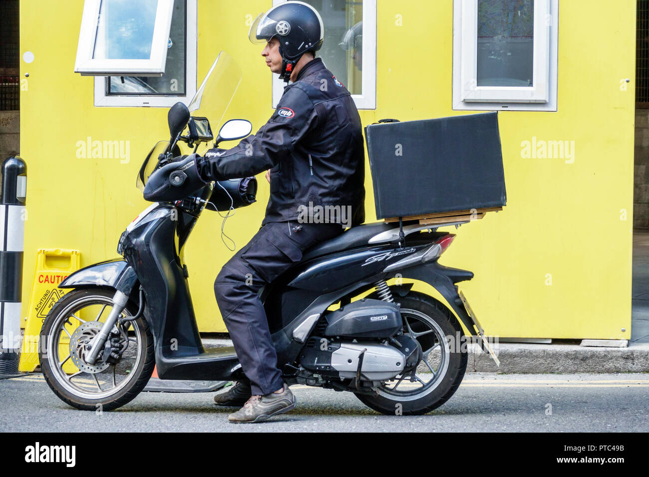 Food delivery motorcycles hi-res stock photography and images - Alamy