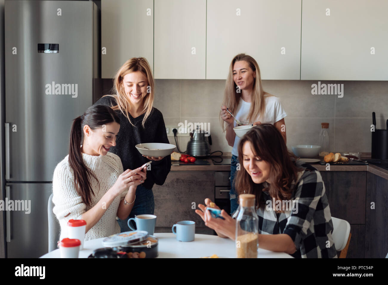group of women in the kitchen Stock Photo - Alamy