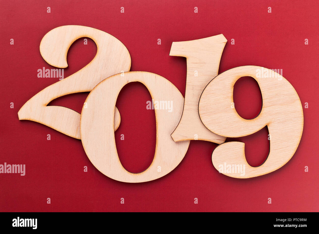 Wooden number 2019 on red background. Cut out wooden text 2019 from ...