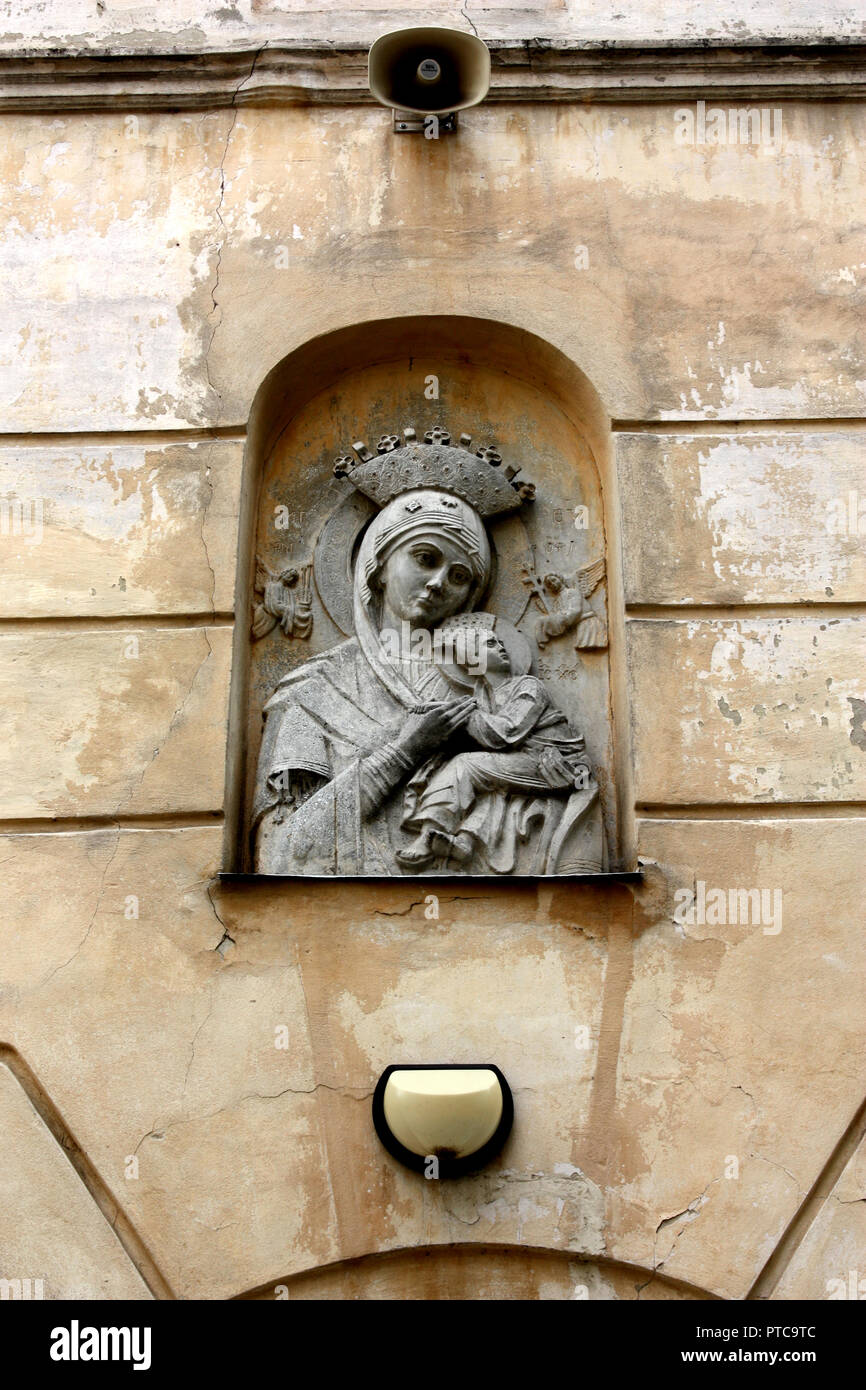 A plaque outside the Church of Our Lady of Perpetual Help in Lviv ...