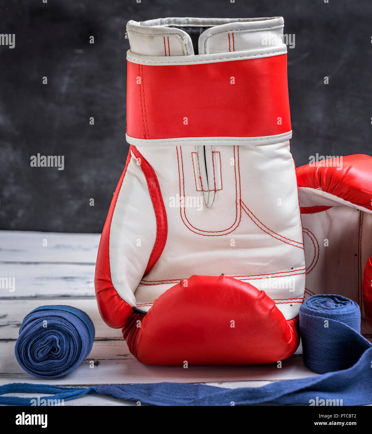 red-white boxing gloves and a blue textile bandage, close up Stock ...