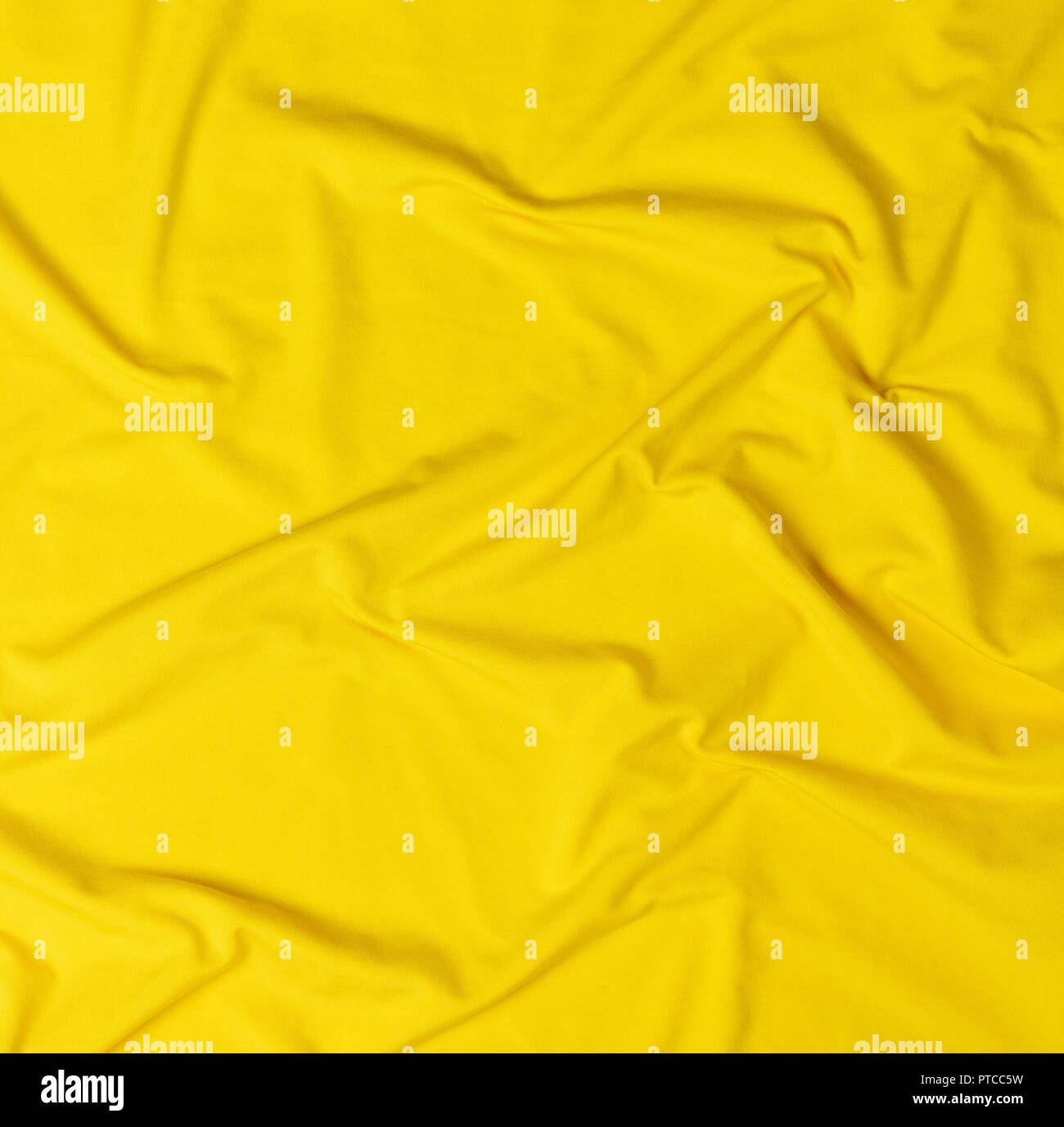 Yellow wrinkled fabric hi-res stock photography and images - Alamy