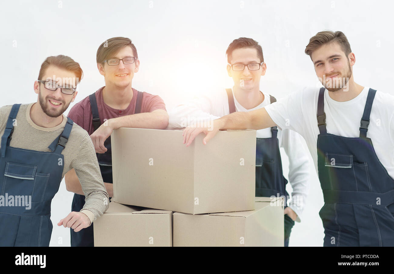 Men holding pile of carton boxes isolated on white background Stock ...