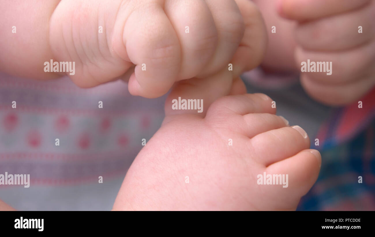 Grabbing Leg Stock Photos & Grabbing Leg Stock Images - Alamy