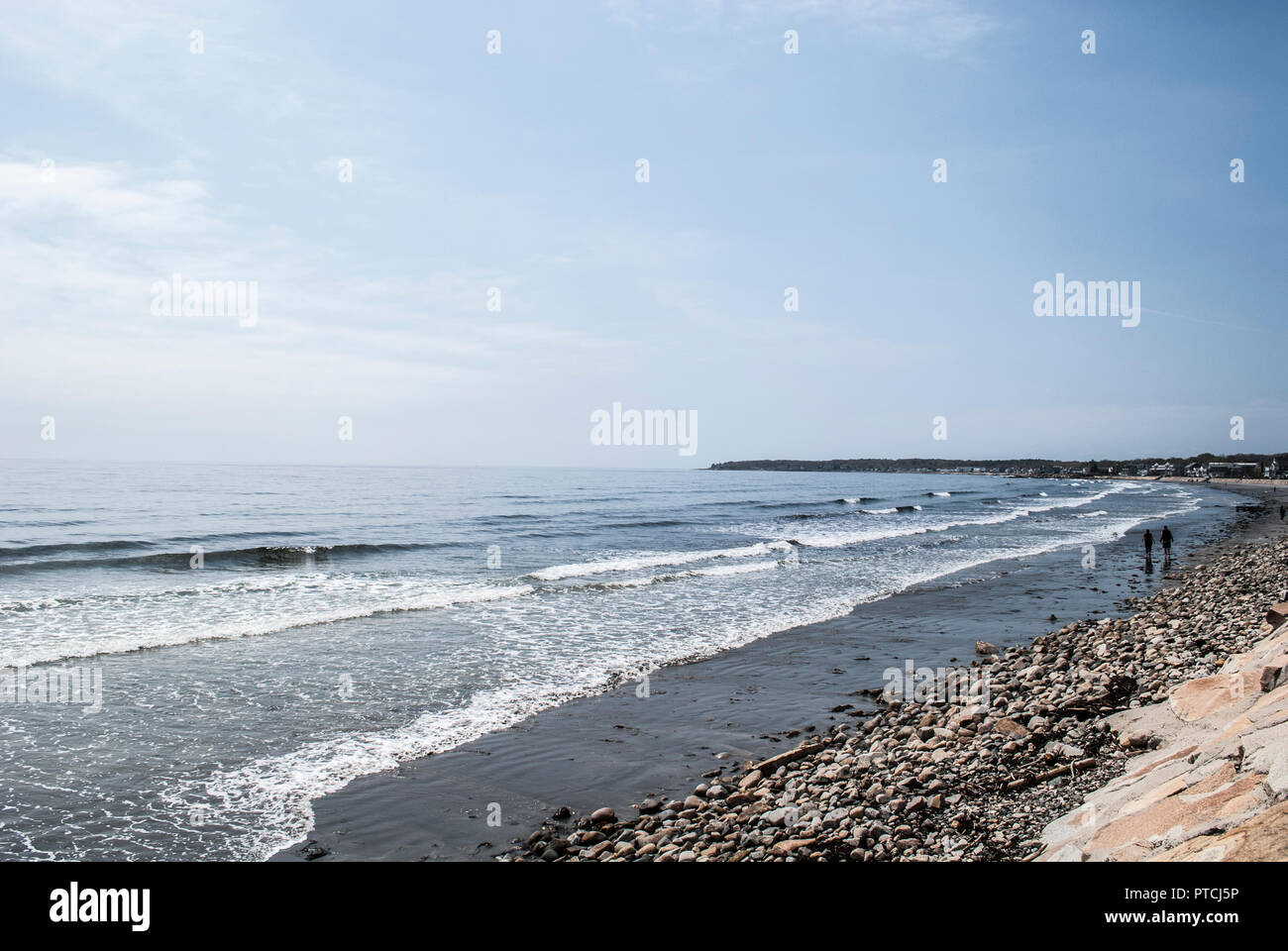 A sunny walk on the beach Stock Photo - Alamy
