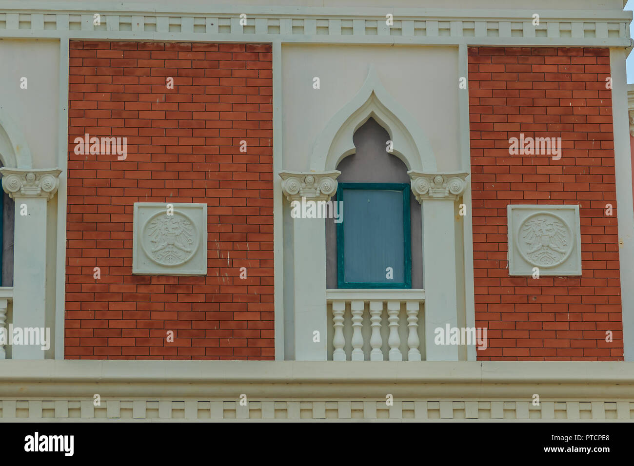 Row of arch windows on the balcony with stucco wall background Stock ...