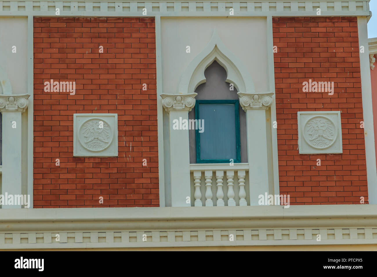 Row of arch windows on the balcony with stucco wall background Stock ...