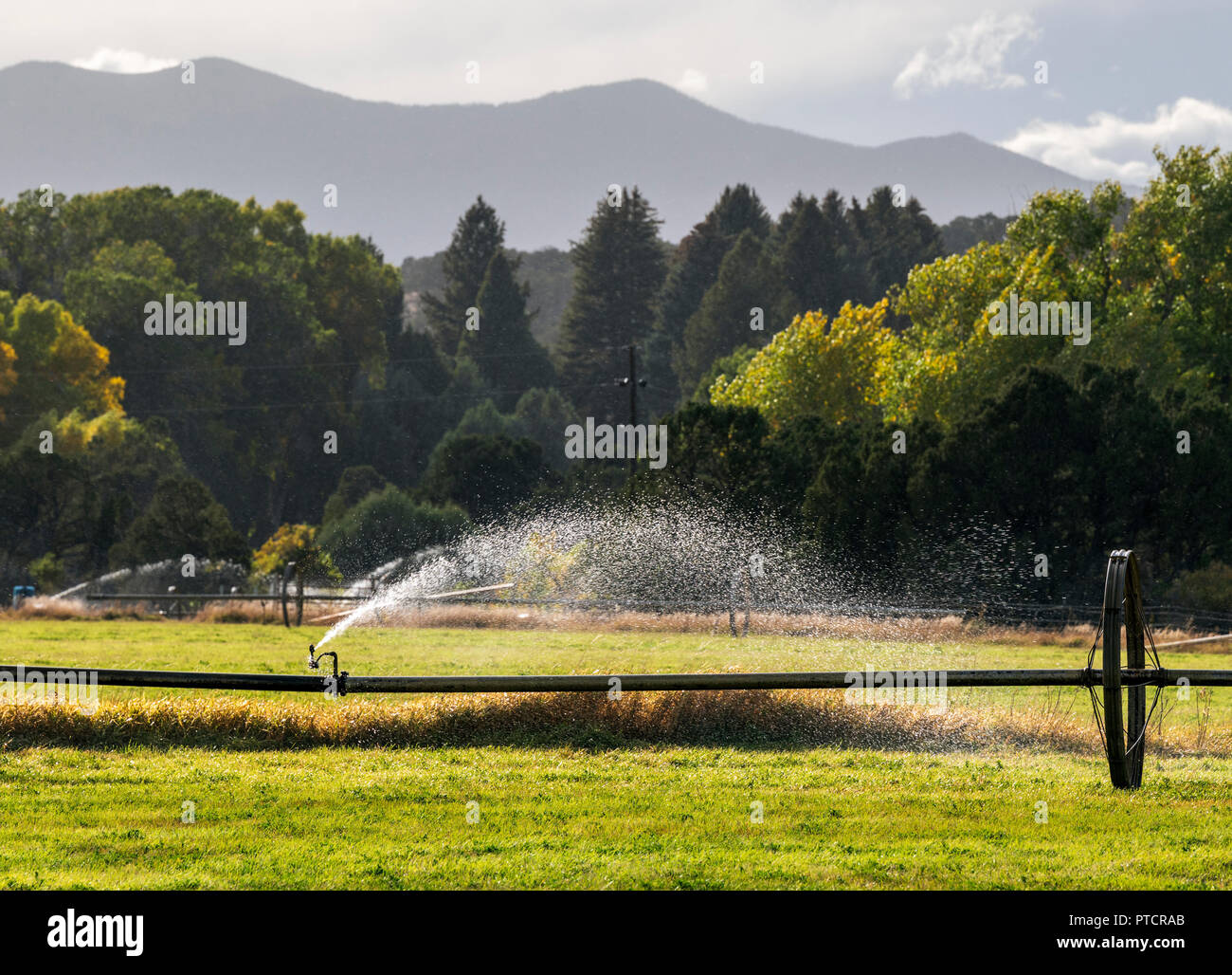Irrigation equipment spraying water on farm fields near Salida ...