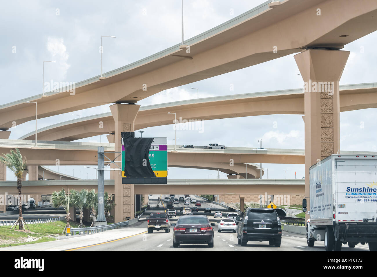 Miami, USA - May 2, 2018: Road street highway green signs under ...