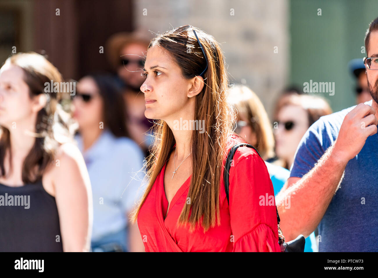 Siena, Italy - August 27, 2018: Closeup portrait of young Italian woman ...
