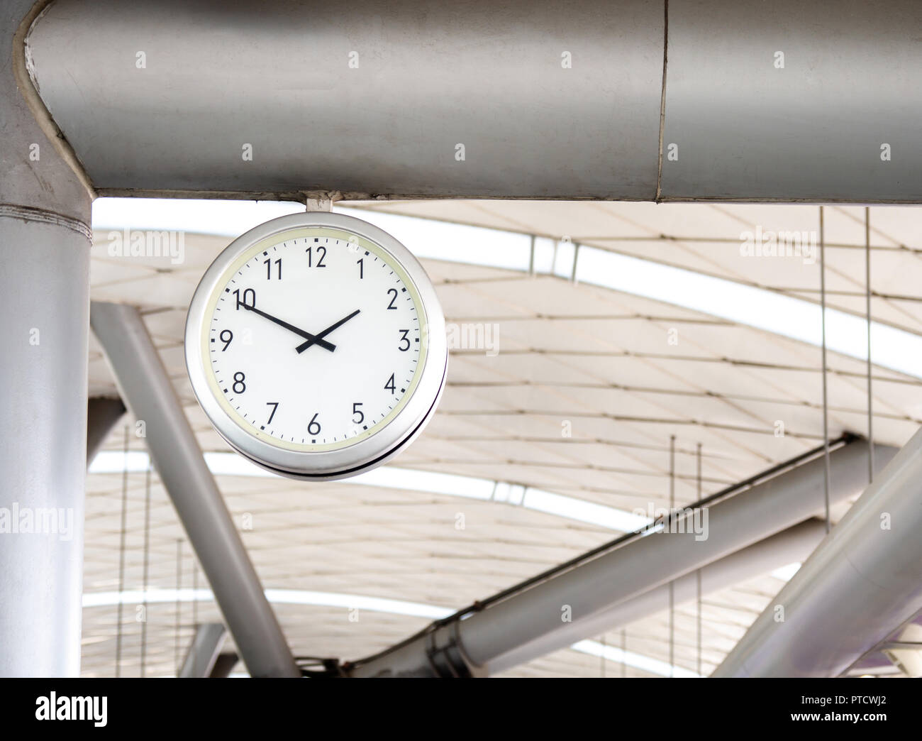 The big wall clock in the subway for passenger looking the time at ...