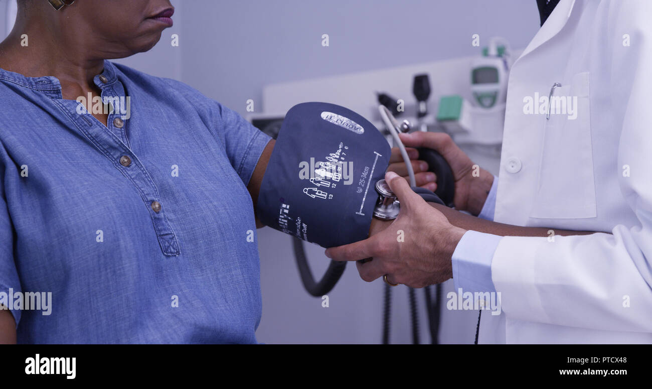 Blood pressure monitor doctors hi-res stock photography and images - Alamy