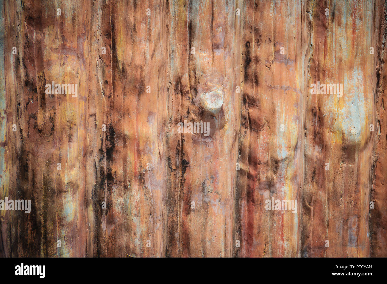 Red concrete wall made like the wood logs. Concrete texture made like ...