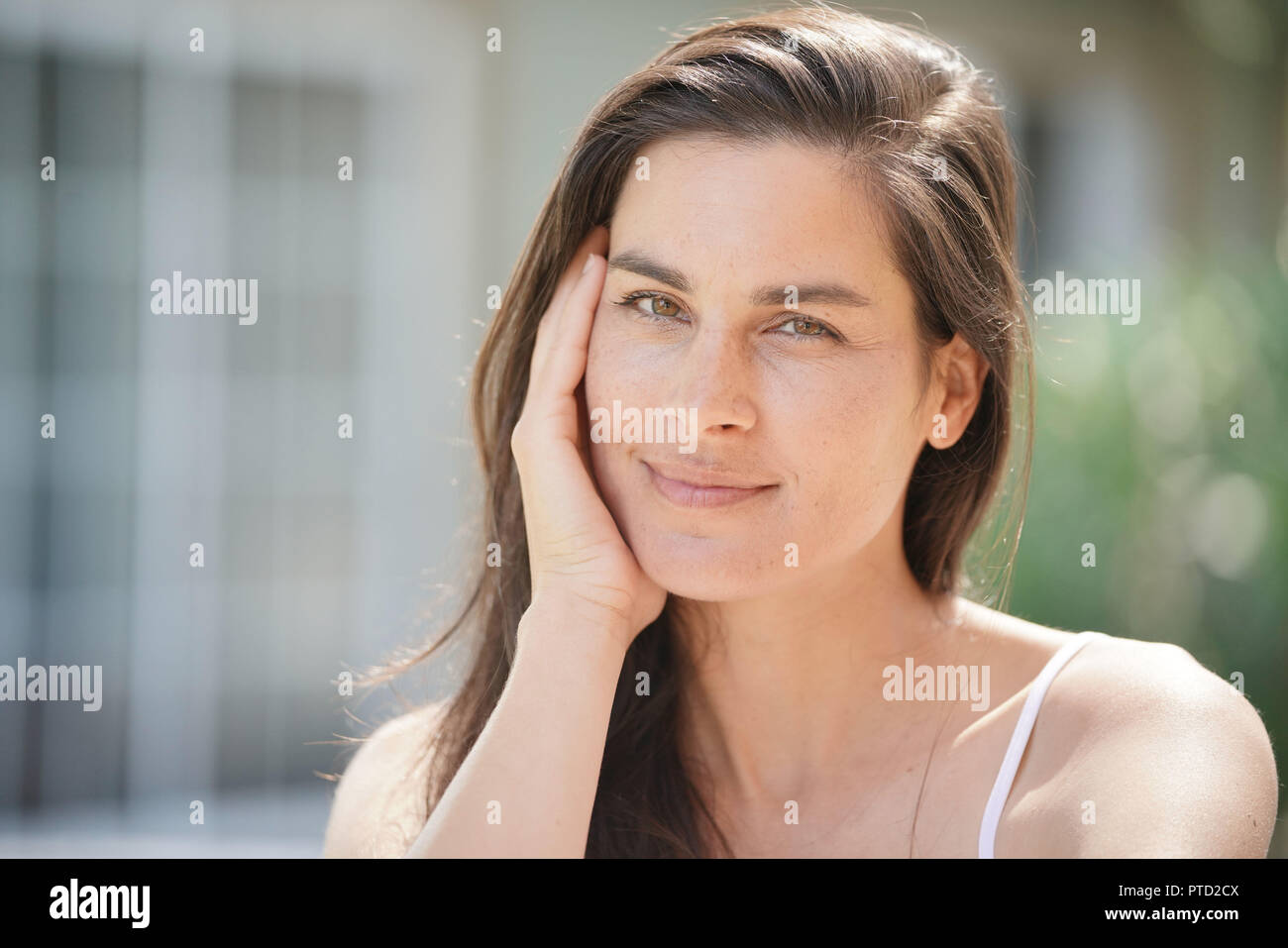 Portrait of attractive 40-year-old brunette woman Stock Photo - Alamy