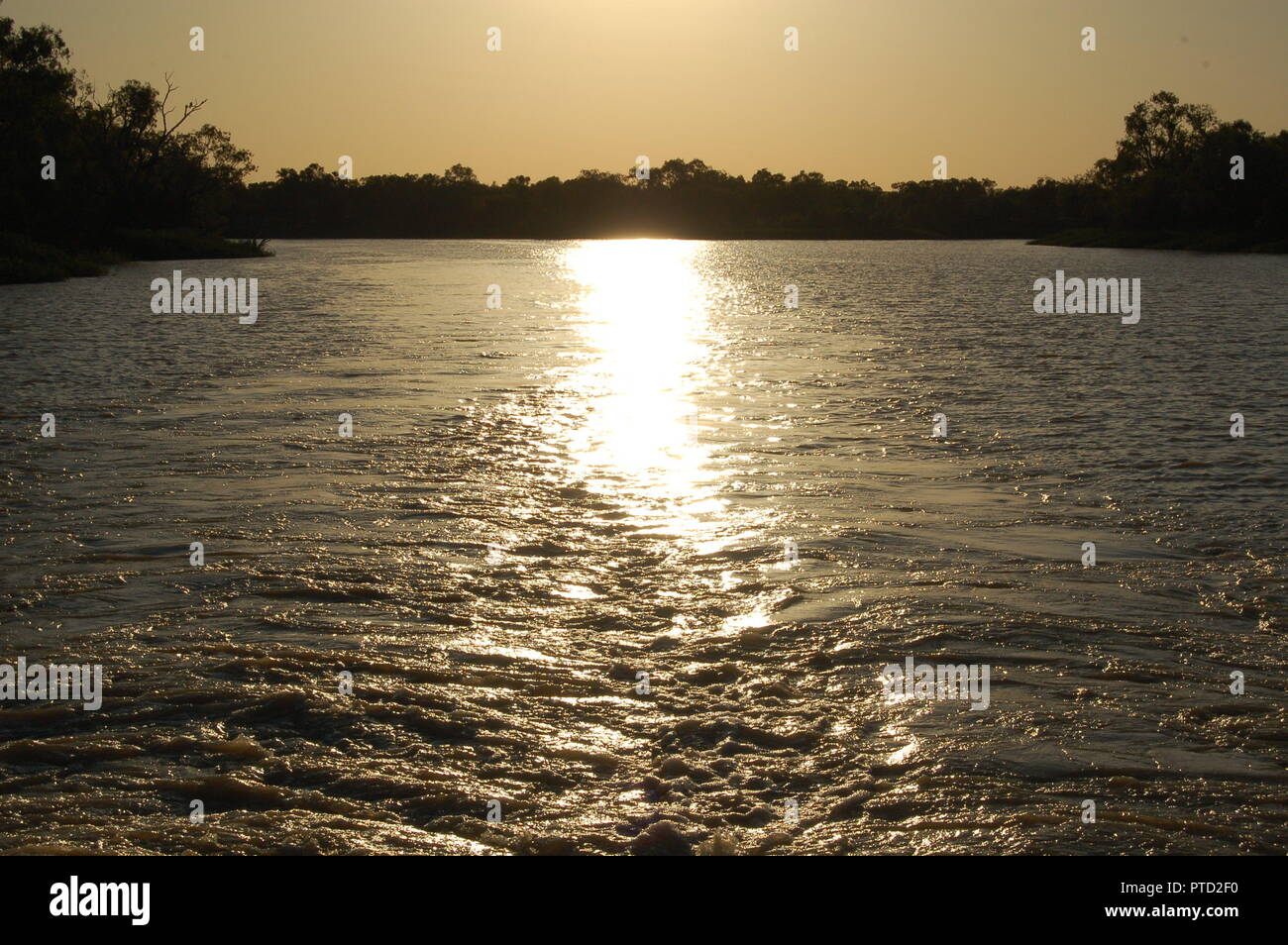 Sunset River Cruise in outback Queensland Stock Photo - Alamy