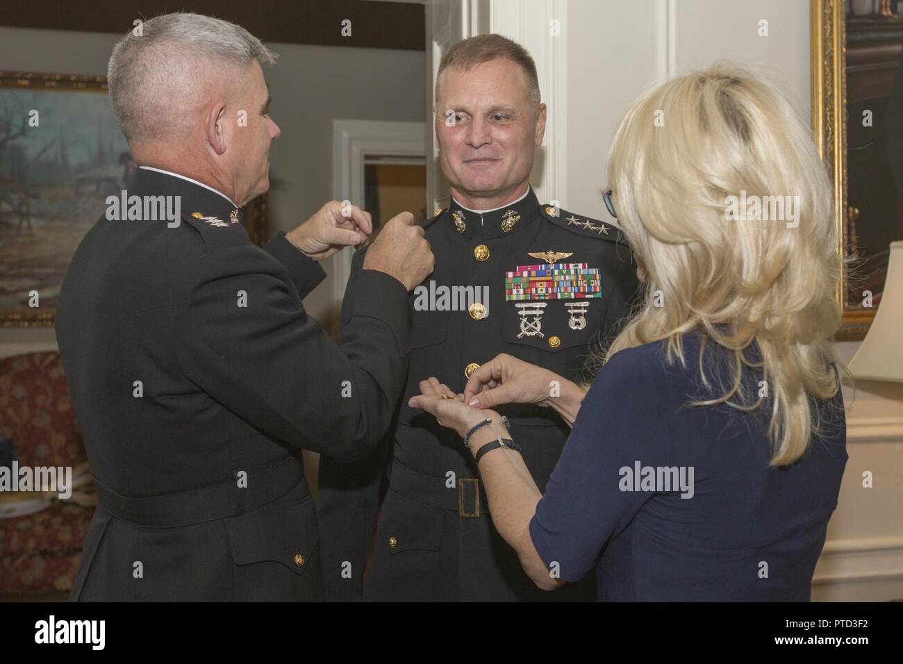 U.S. Marine Corps Maj. Gen. Steven R. Rudder is pinned to the rank of ...