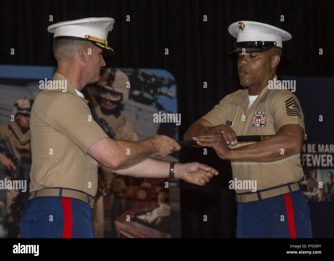 Sergeant Major Cortez L. Brown, right, receives the Noncommissioned ...
