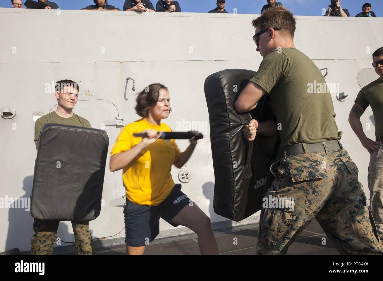 Ensign Lauren Symmes, assigned to USS Mesa Verde (LPD 19), defends ...