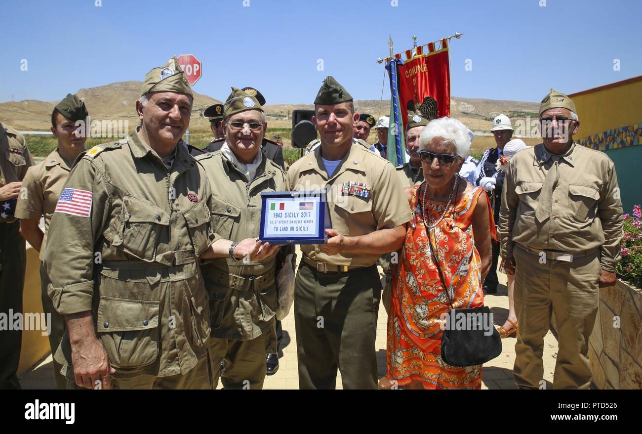 Lt. Col. Shawn P. Grzybowski, third from left, the commanding officer ...
