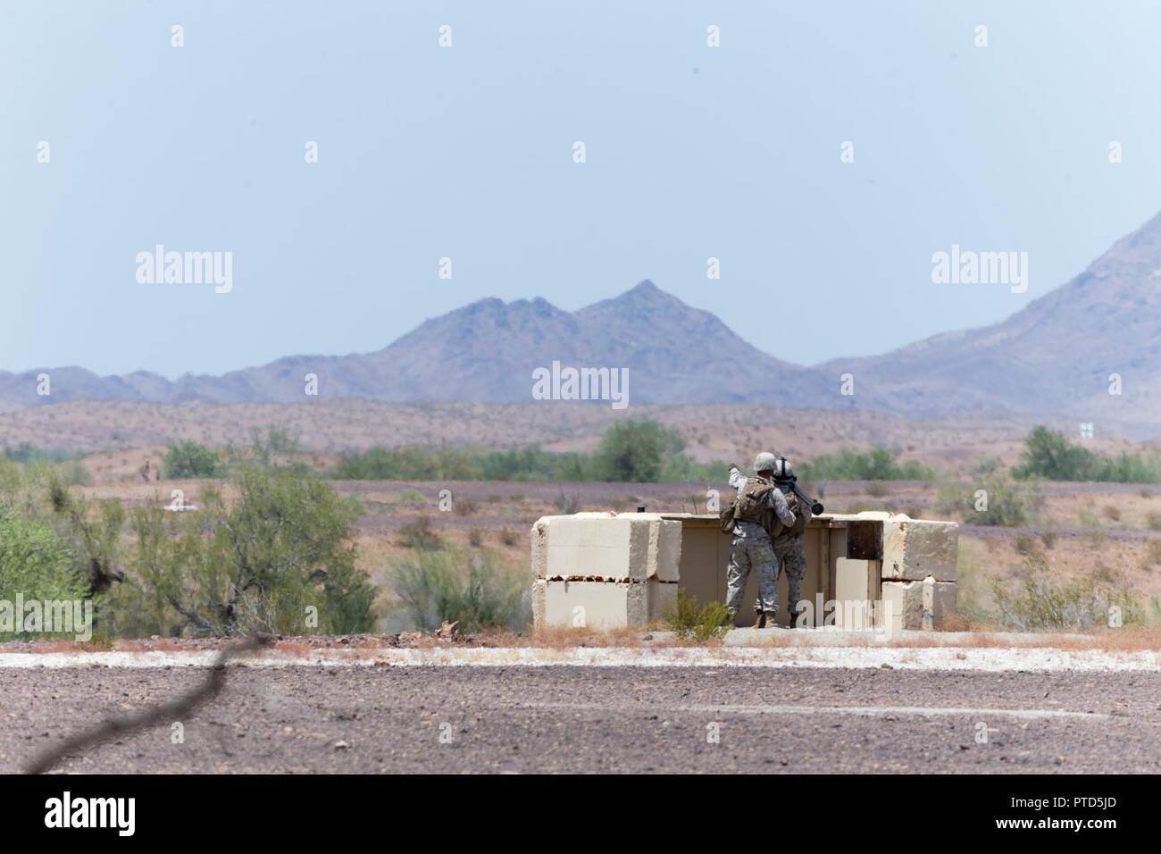 U.S. Marine Corps Sergeant Johnathon Moore (left) and Lance Cpl Spenser ...