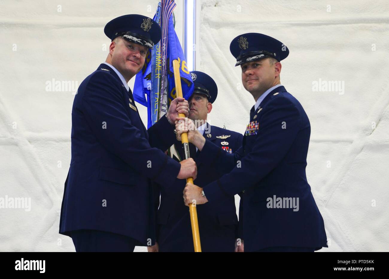 Col. Richard Carrel, 59th Operations Group commander, passes the 36th ...