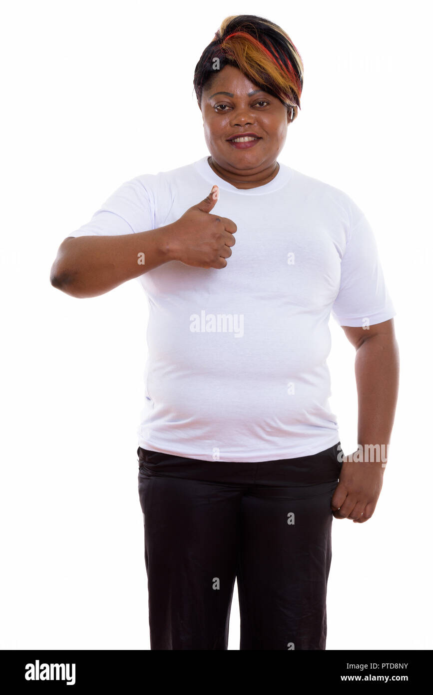 Studio shot of happy fat black African woman smiling and standin Stock ...