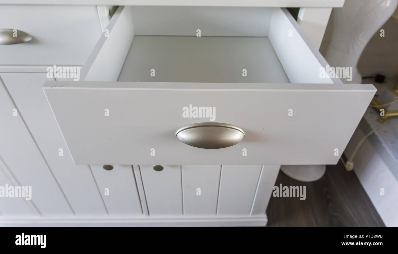 Empty open modern white wooden drawer with nothing inside so empty ...