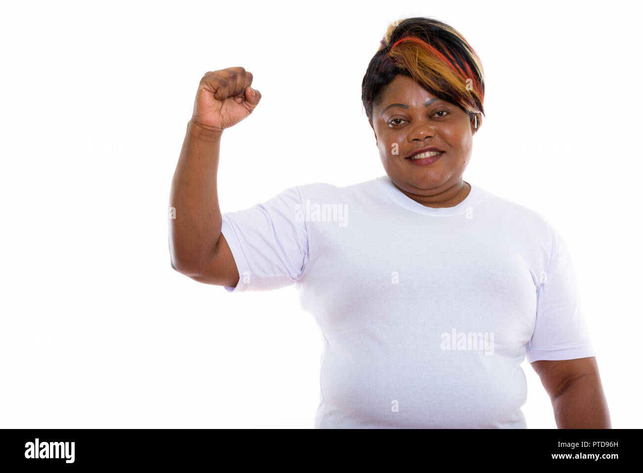Studio shot of happy fat black African woman smiling while looki Stock ...
