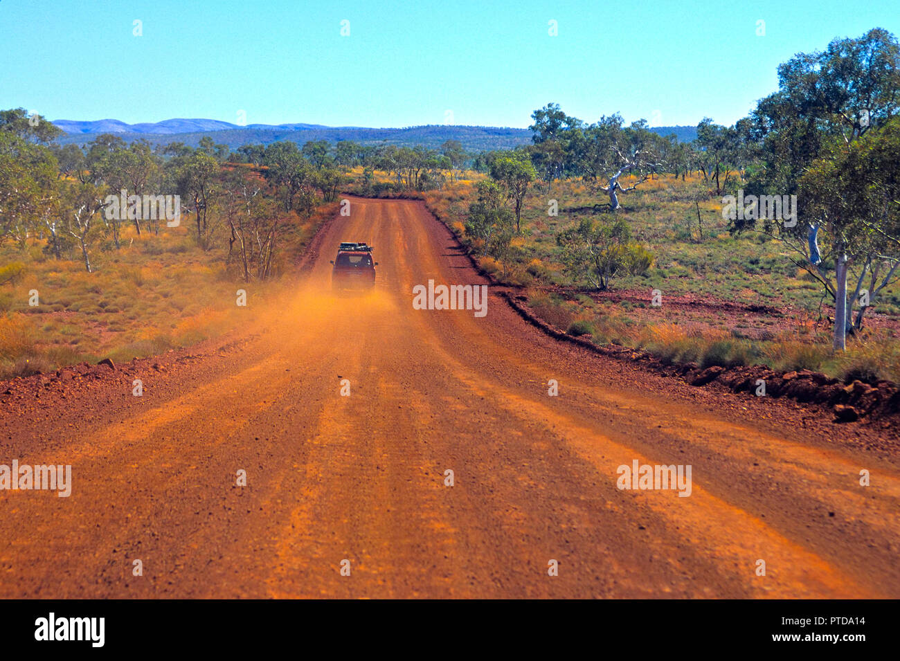 Car travelling on Australian outback road, Karijini National Park ...
