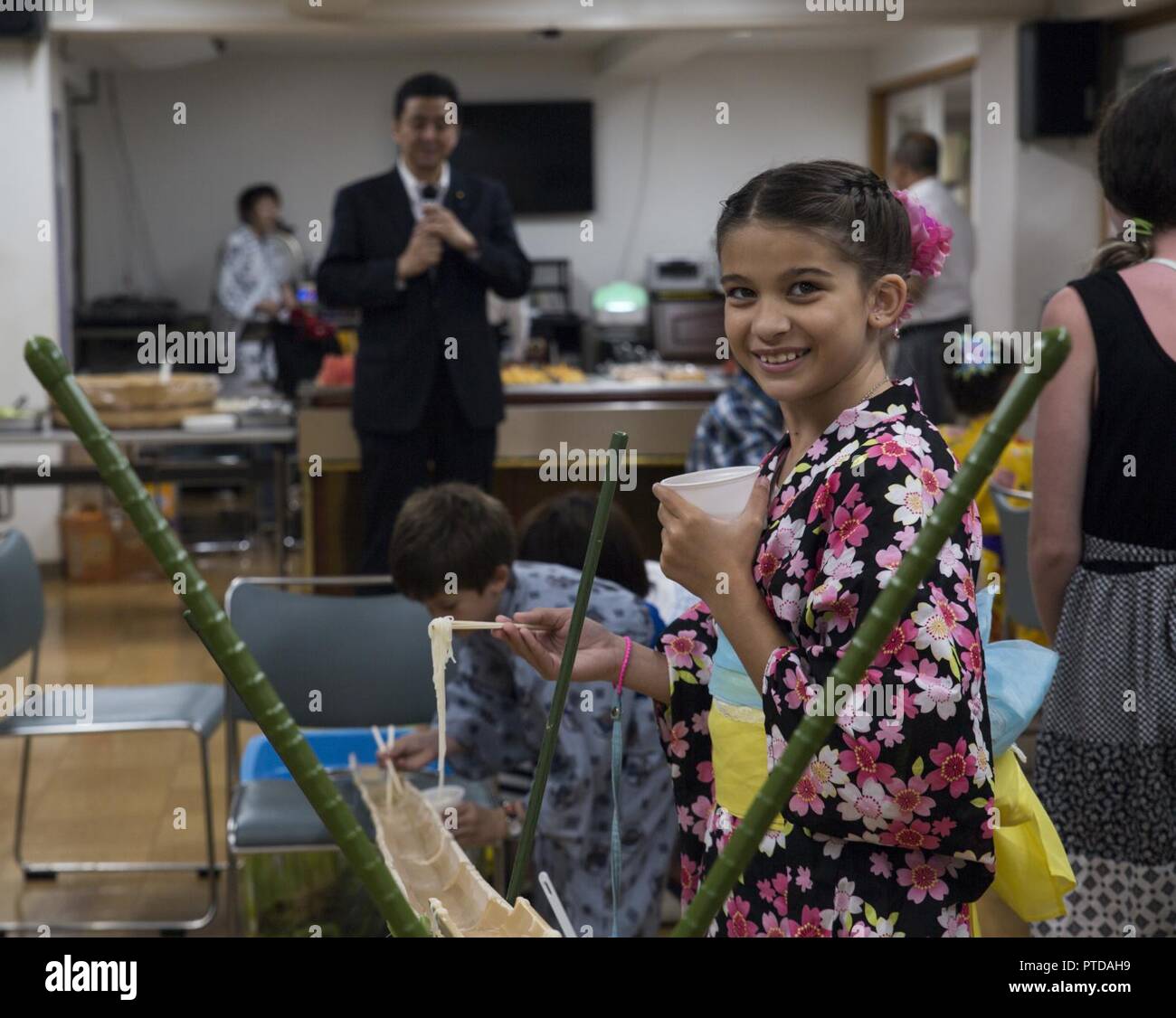 Celeste Hill, a Marine Corps Air Station Iwakuni resident, eats somen ...