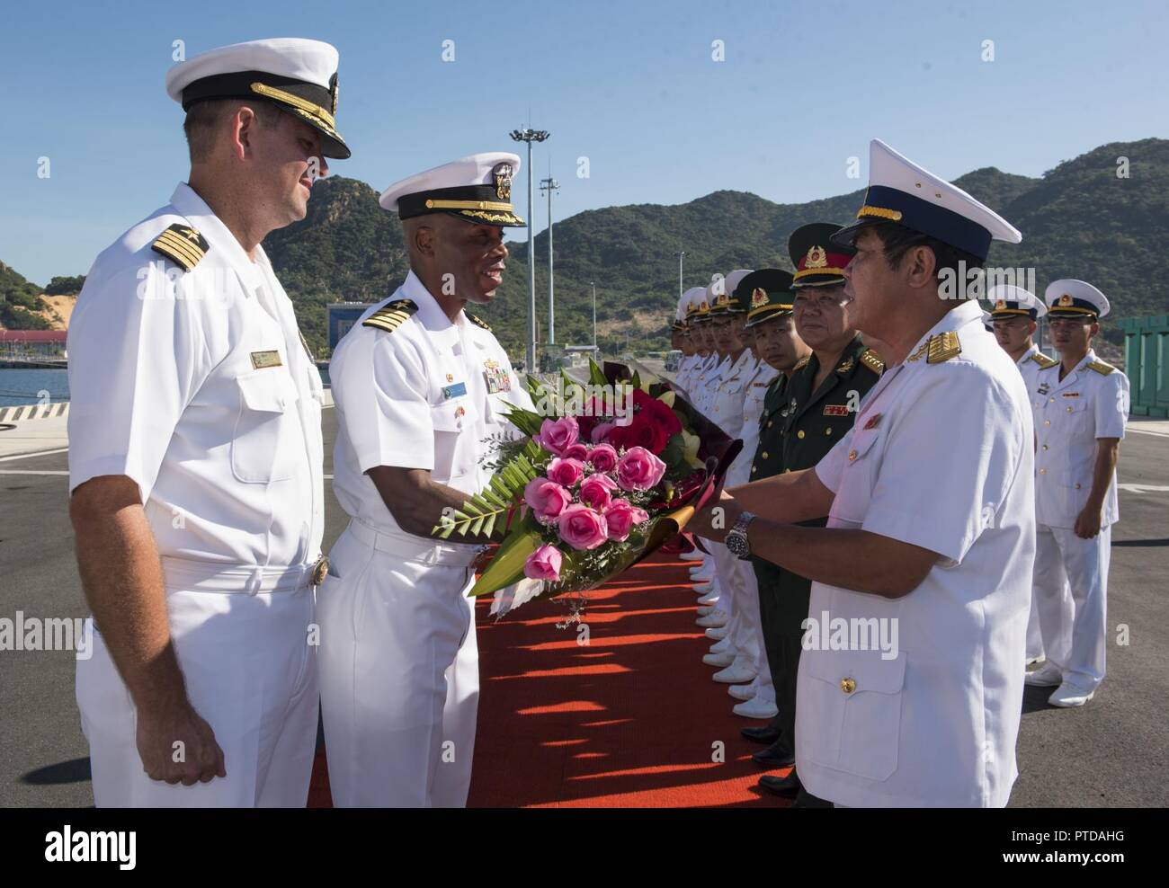 CAM RANH, Vietnam (July 10, 2017) Capt. Chris Sharman (left), Naval ...
